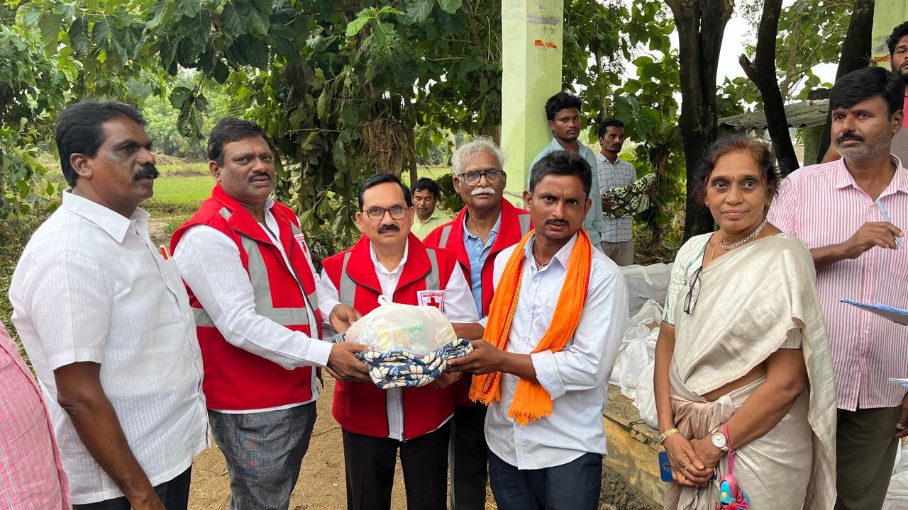 Dr. Nehru Nayak distributes the essential commodities to flood-affected ...